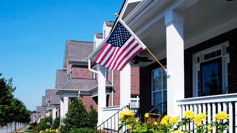 4 Tips For Hanging A Flag On A Wall Exterior Angi
