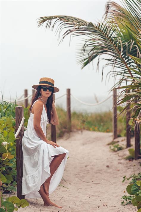 Premium Photo Happy Woman On Her Way On The Beach Smiling Girl In