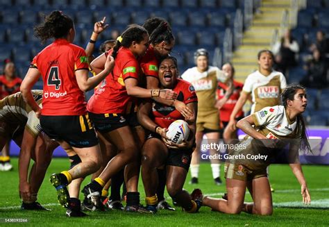 Essay Banu Of Papua New Guinea Celebrates With Teammates After News
