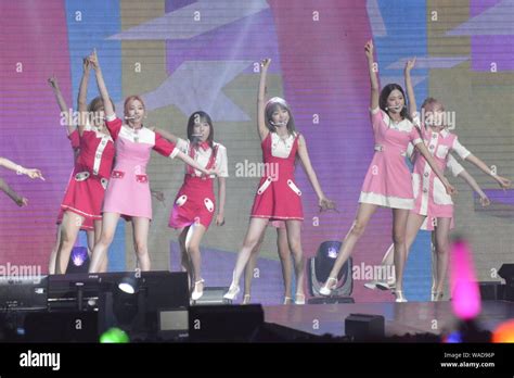 Members Of South Korean Girl Group Izone Stylized As Izone Perform