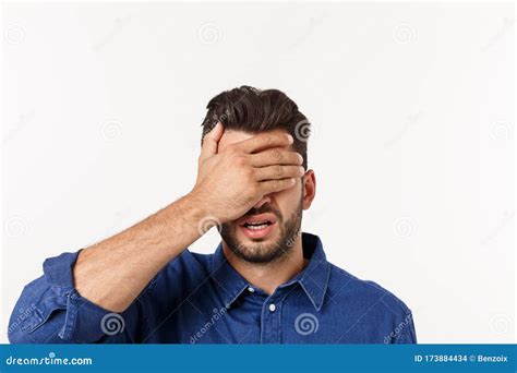 Close Up Portrait Of Disappointed Stressed Bearded Young Man In Shirt