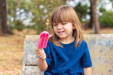Girl Sucking Popsicle