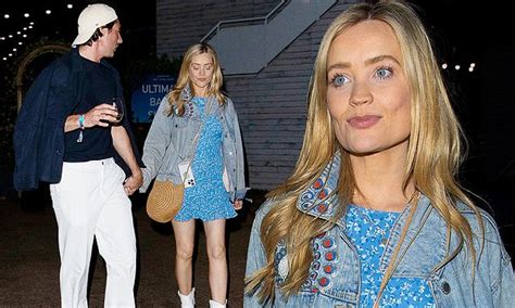 Laura Whitmore Cuts A Stylish Figure In Blue Floral Dress As She Holds