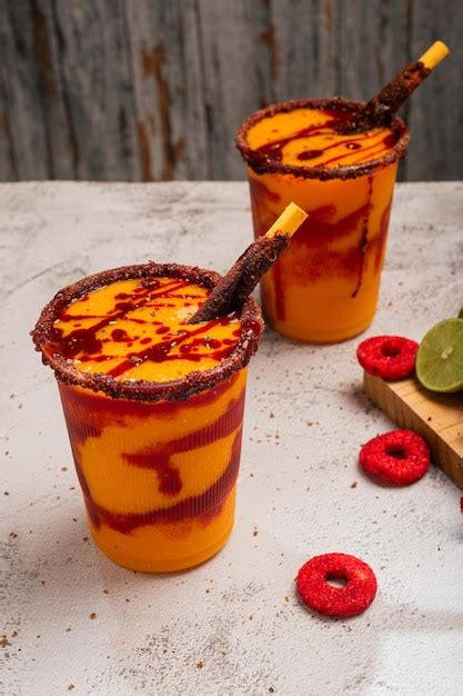 Premium Photo Mangonada Typical Mexican Mango Smoothie With Chamoy Sauce And Lime Juice
