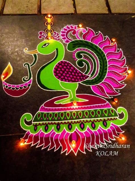 Beautiful And Attractive Peacock Design Rangoli Kolangal