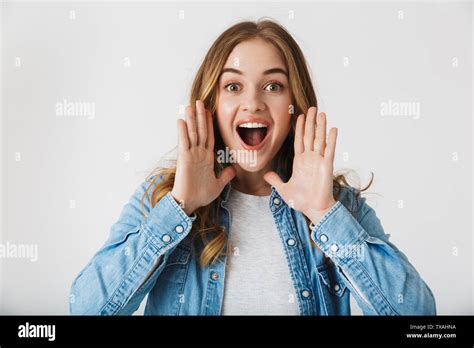 Attractive Young Girl Standing Isolated Over White Background Shouting