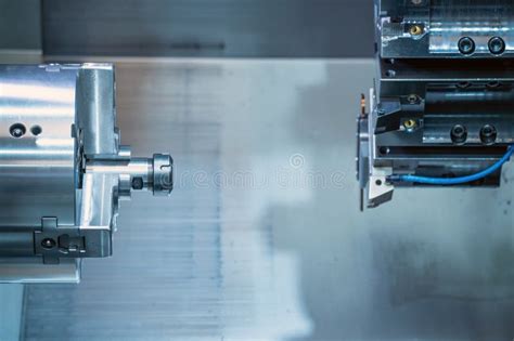 The Cnc Lathe Machine Forming Cutting The Metal Parts Hi Technology Metal Working By Cnc