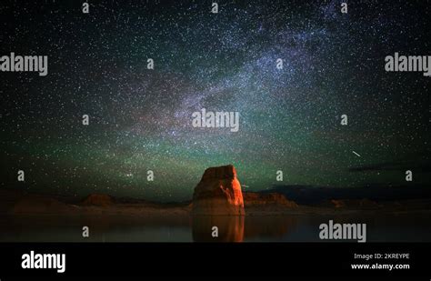 Astrophotography Time Lapse Of Milky Way And Lone Rock In Lake Powell