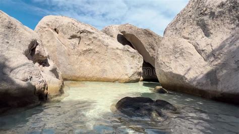 A Video Showing Slow Motion Water Movement Between Rock Formations