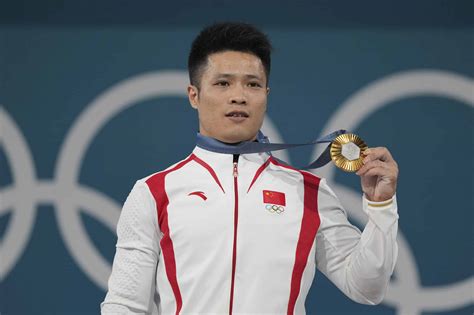 Chinese Duo Retain Olympic Titles As Paris Weightlifting Starts