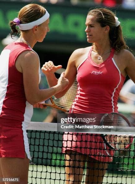Amelie Mauresmo Of France Congratulates Svetlana Kuznetsova Of Russia