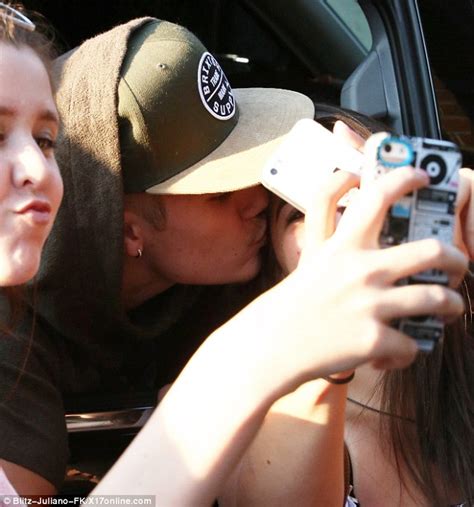 Justin Bieber Plants A Kiss On Passing Fan As He Rides Around LA Daily Mail Online