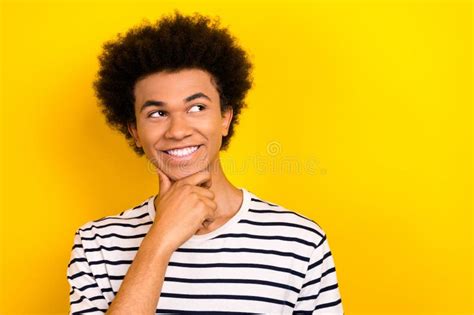 Portrait Of Cheerful Smart Guy Touch Chin Smile Look Empty Space
