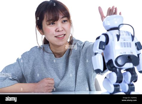 Woman Chatting With Mini Robot Stock Photo Alamy