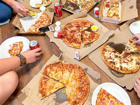 National Pizza Month Deals To Expect In 2024 — Dominos And More The
