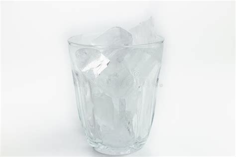 Ice Cubes In Glass Isolated On White Background Shallow Depth Of Field