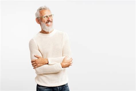 Premium Photo Smiling Mature Man Wearing Eyeglasses Holding Arms