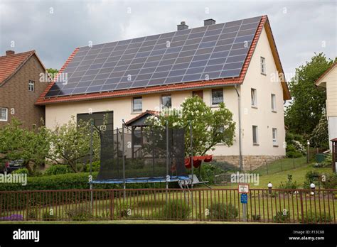 Photovoltaic Solar Pv Panels On Roof Of Private House Germany Stock