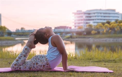 Premium Photo Side View Full Length Of Girl Exercising On Field