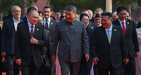 Kim Jong Un Stands Center Stage With Xi Putin At Chinas Military