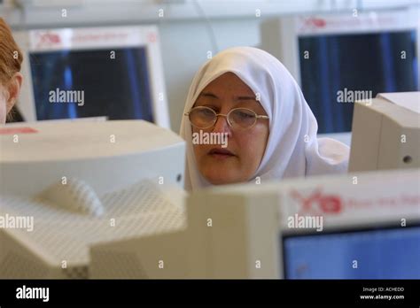 Mature Female Student In Computer Class At London Fe College Stock