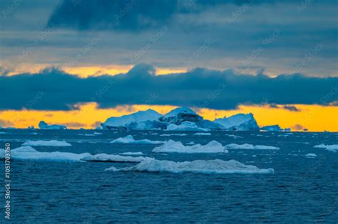 Sunset Over The Floating Icebergs Ilulissat Icefjord Unesco World