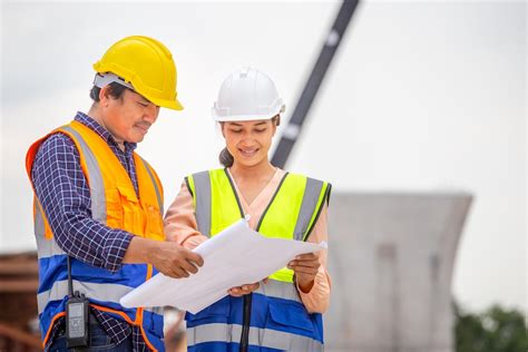 Premium Photo Female Engineer And Foreman Worker Checking Project At Building Site Engineer