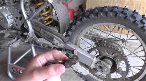 How To Adjust And Shorten Dirt Bike Chain - YouTube