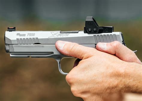 The Sig Sauer P320 Goes Heavy Metal With The Xfive Sxg Popular Airsoft Welcome To The Airsoft