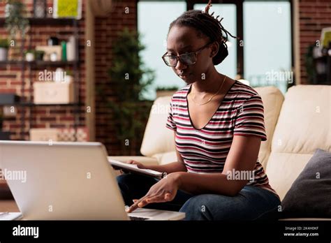Remote Employee Holding Clipboard With Report Working In Home Office