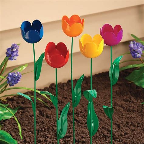 Flores hechas de botellas de plástico aprende como se hacen y ayuda al