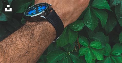 Foto La Mano De Un Hombre Con Un Reloj De Pulsera Imagen Reloj De