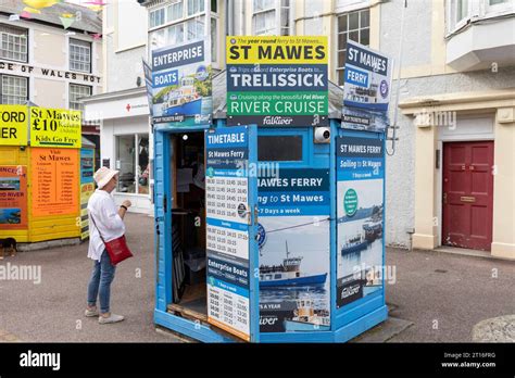 Falmouth Pier Cornwall Model Released Woman Browsing Boat And Ferry Trips From Falmouth England