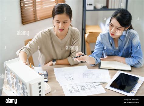 Engineering Construction Concept Two Female Engineers Pointing And