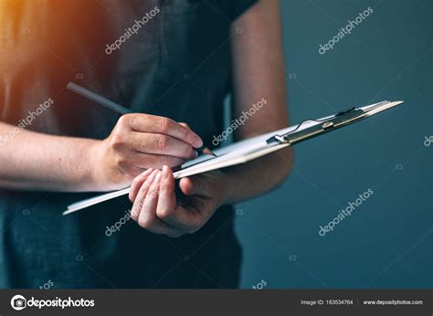 Casual Adult Female Writing Notes On Notepad Paper Stock Photo Stevanovicigor 163534764