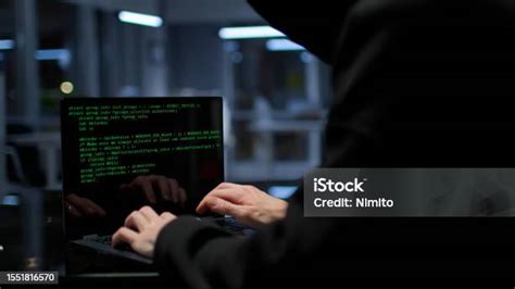 Computer Hacker Typing Code On Keyboard Late Night Working And