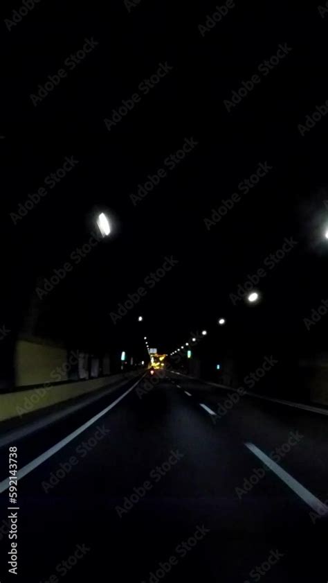 高速道路のトンネル内を走行する車からの車載映像の縦動画 Stock Video Adobe Stock