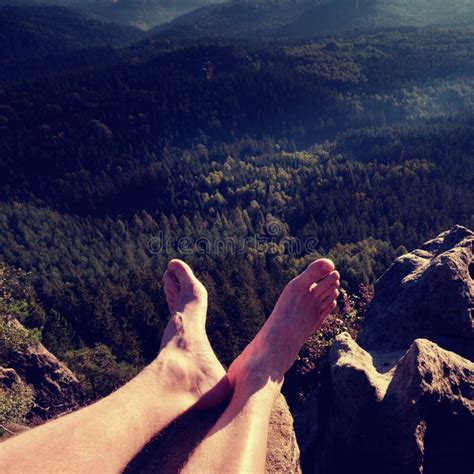 Naked Male Legs Take Rest On Peak Outdoor Activities Stock Photo