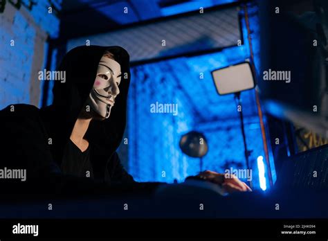 Close Up Low Angle View Of Unrecognizable Hooded Hacker Man Wearing