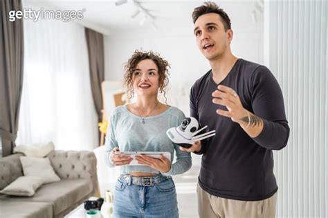 Man And Woman Couple Wife Husband Set Up Surveillance Security Camera