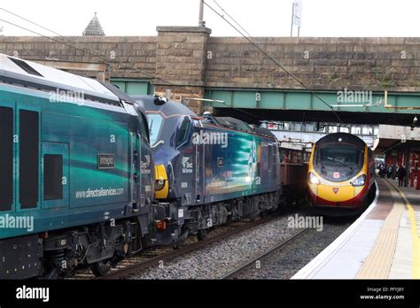 Pendolino Electric Train Arriving At Lancaster Station On Wcml Passing
