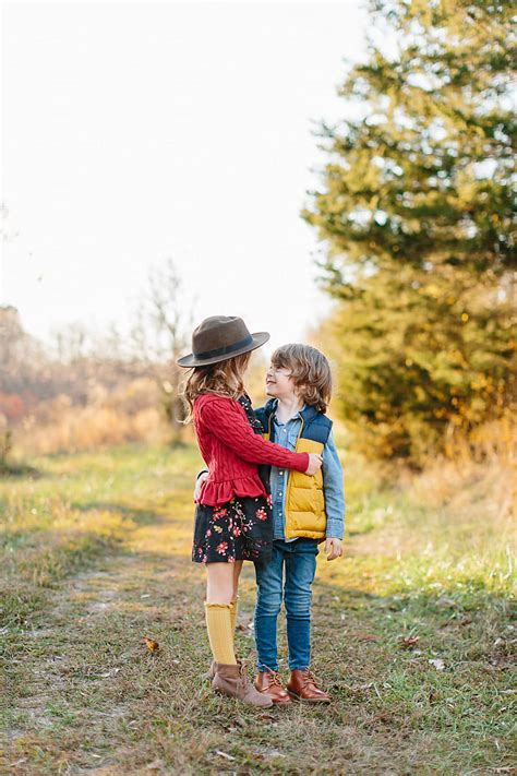 Cute Brother And Sister Looking At Each Other By Stocksy Contributor Jakob Lagerstedt Stocksy