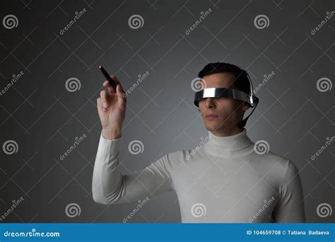 Man Using Futuristic VR Goggles Stock Photo Image