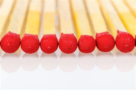 Premium Photo Matches With A Red Head On A White Background