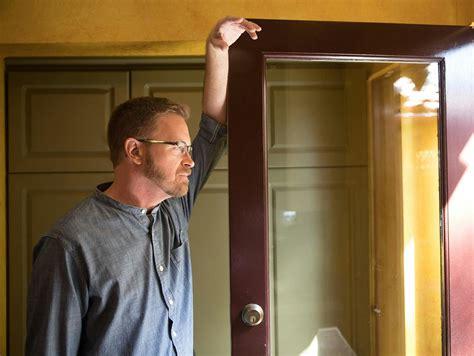 Man Opening Front Door