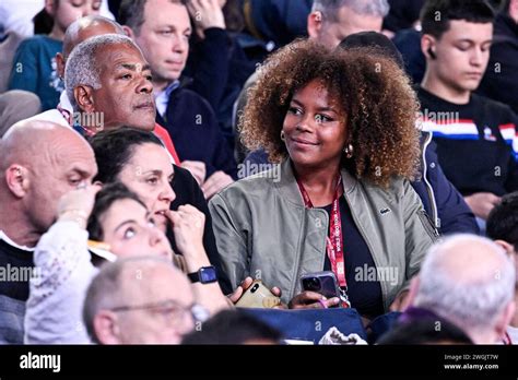luthna plocus wife of teddy riner and his father moise during the paris