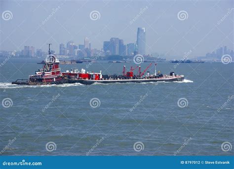 Tugboat Pushing Barge In New York Harbor Stock Photo Image Of Tour