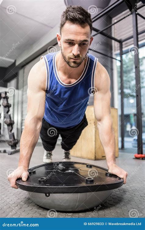 Muscular Man Doing Push Up On Bosu Ball Stock Image Image Of Body