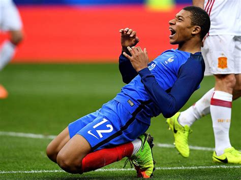 Kylian Mbappe Kneeling As Celebration Wallpaper Wallpapersok