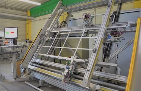 The Quadrobot Is A Vertical Assembly Device For Inserting The Glazing